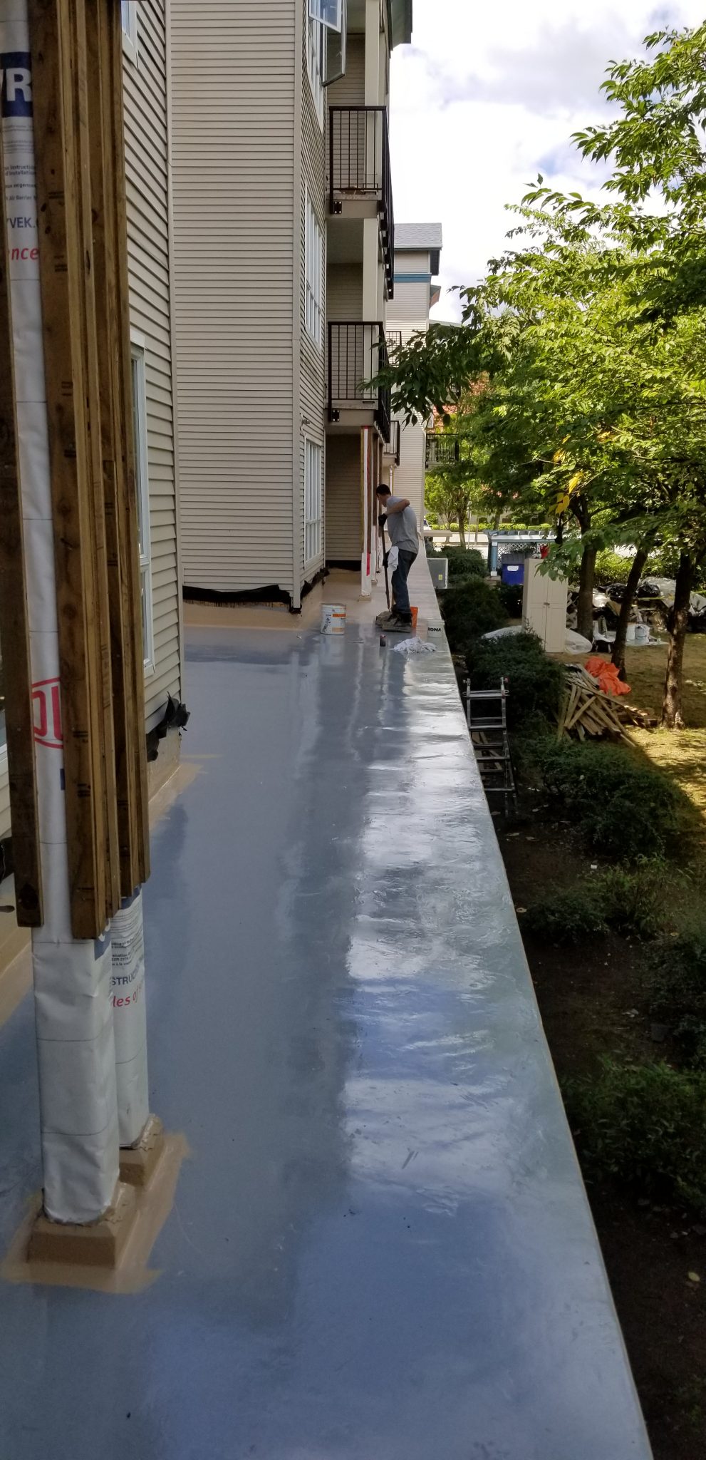 Liquid Membrane Being Applied - Cunningham Sealing